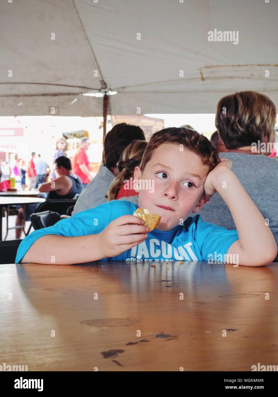 Boy eating snack hi-res stock photography and images - Alamy