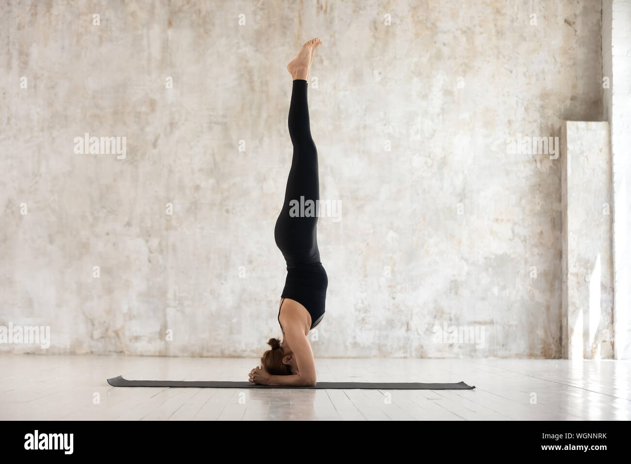 Girl doing handstand hi-res stock photography and images - Alamy