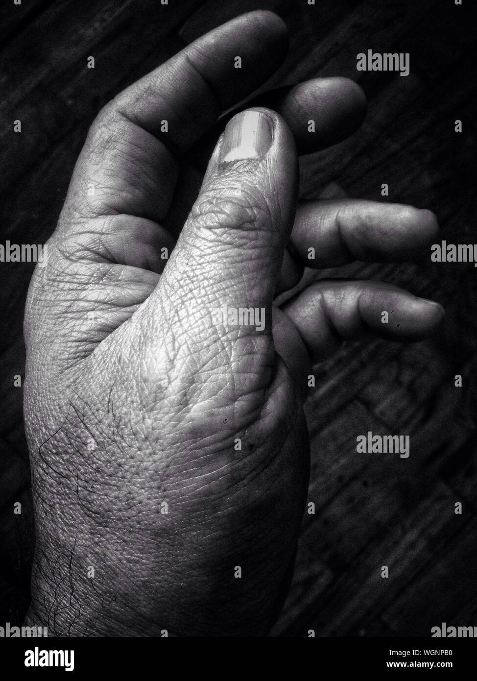 Hand wrinkled hi-res stock photography and images - Alamy