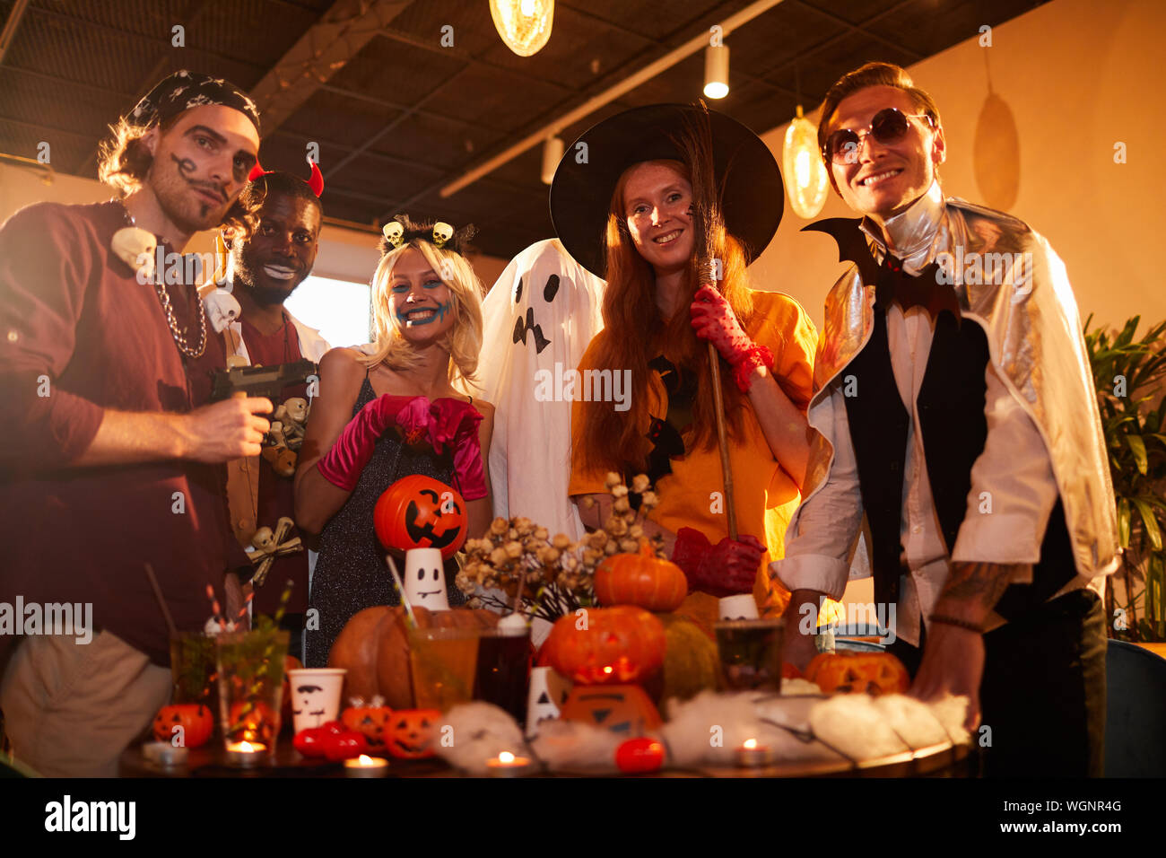 Laughing men posing at party at night hi-res stock photography and ...