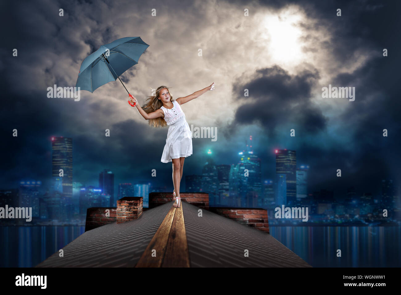 Women rooftop dramatic hi-res stock photography and images - Alamy