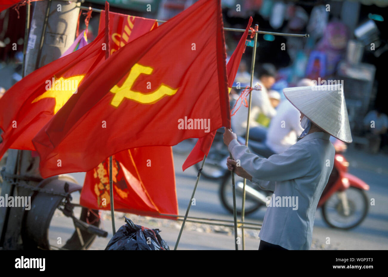 Person holding red flag hi-res stock photography and images - Alamy