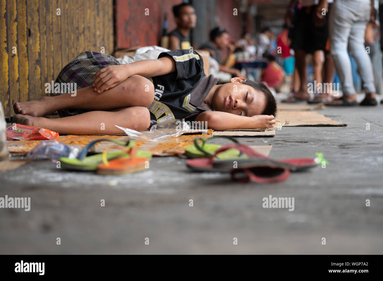 Slum area, child, sleeping hi-res stock photography and images - Alamy