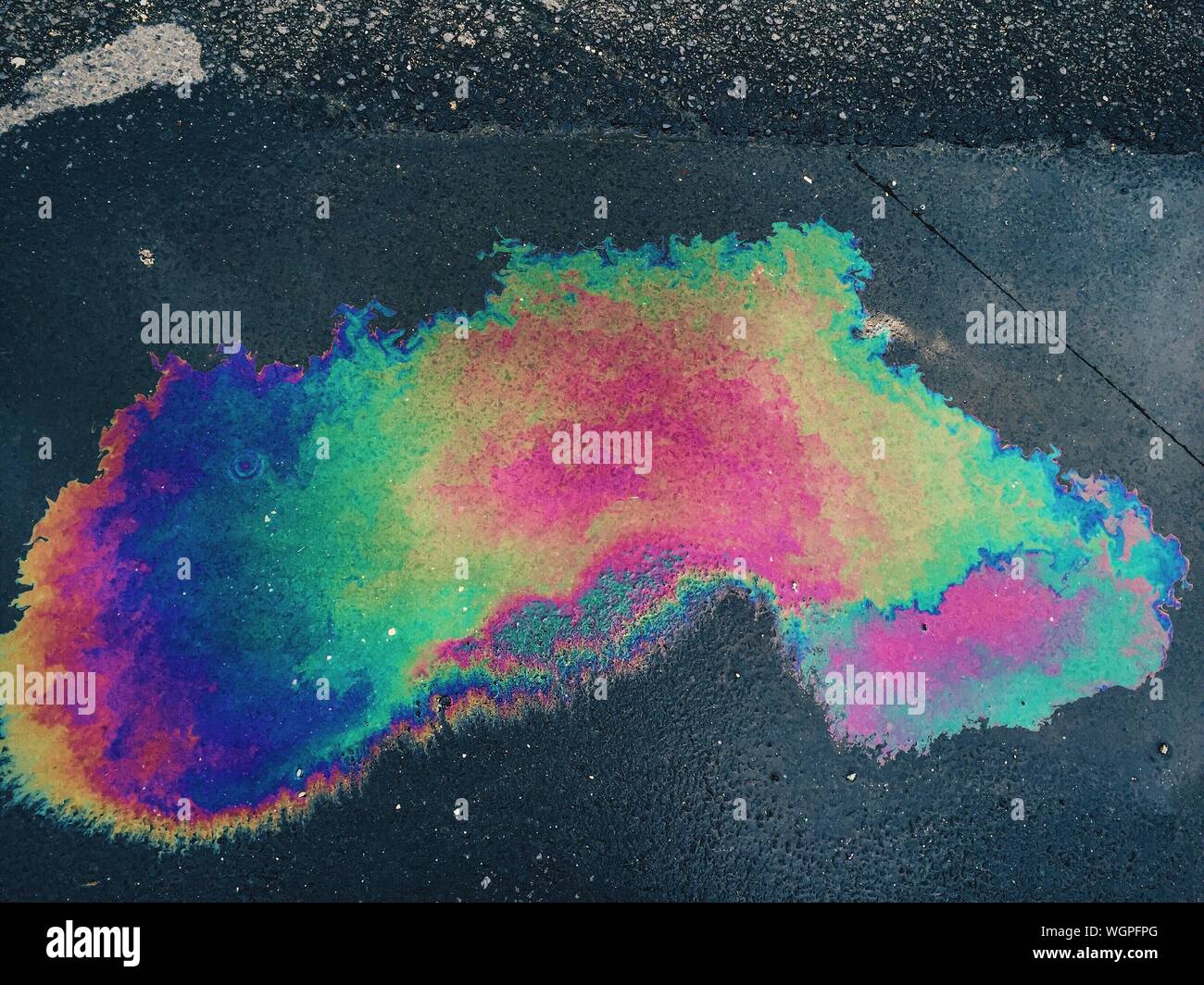 Rainbow oil spill hi-res stock photography and images - Alamy