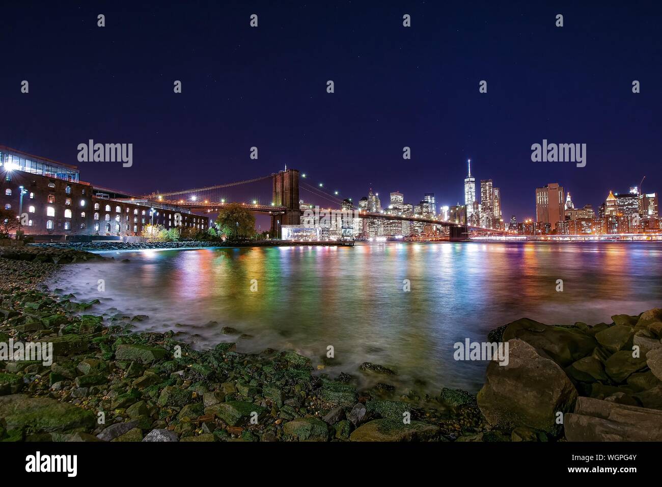 Brooklyn and manhattan bridges over the east river at night hi-res ...