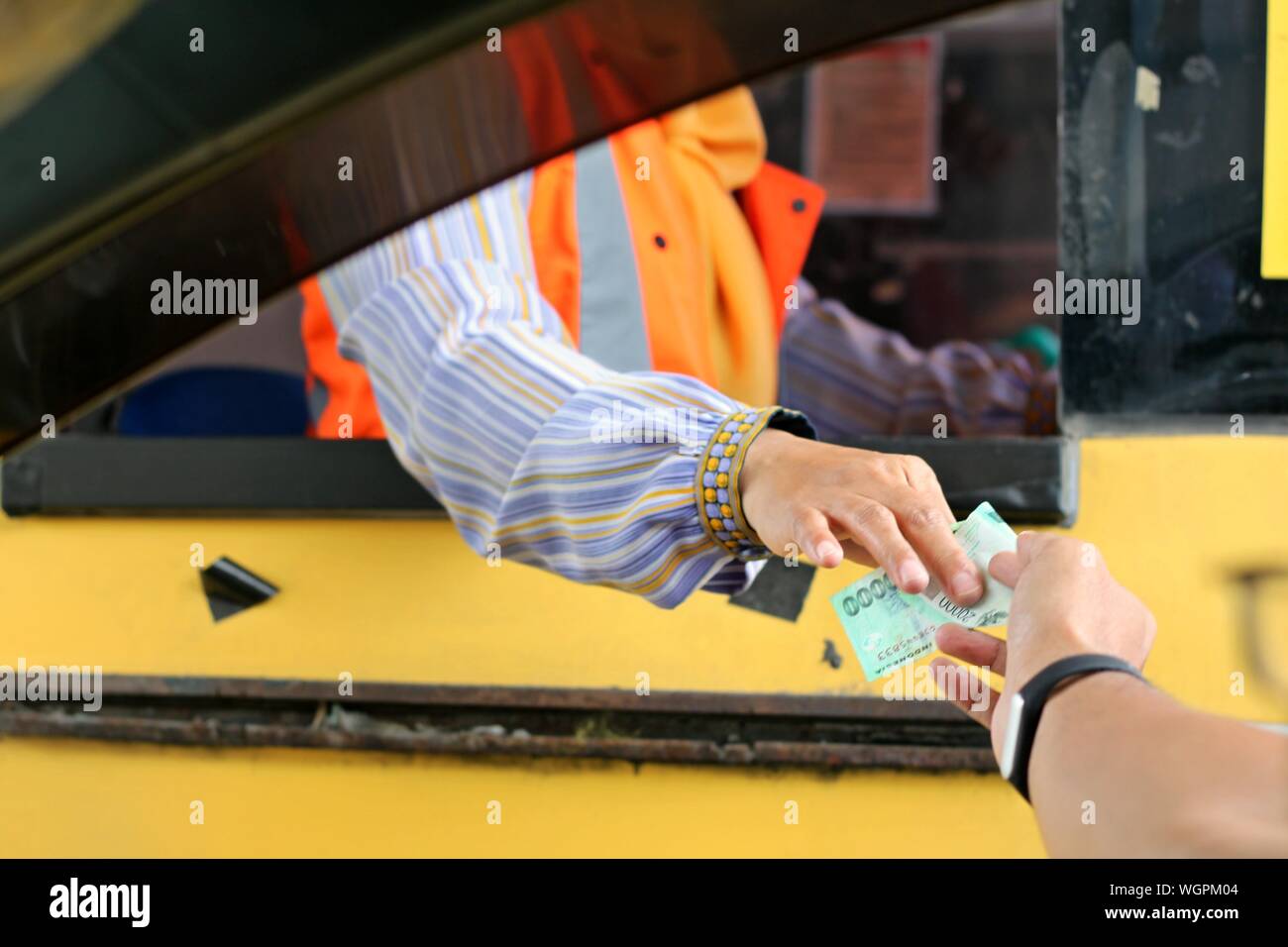 Human toll hi-res stock photography and images - Alamy