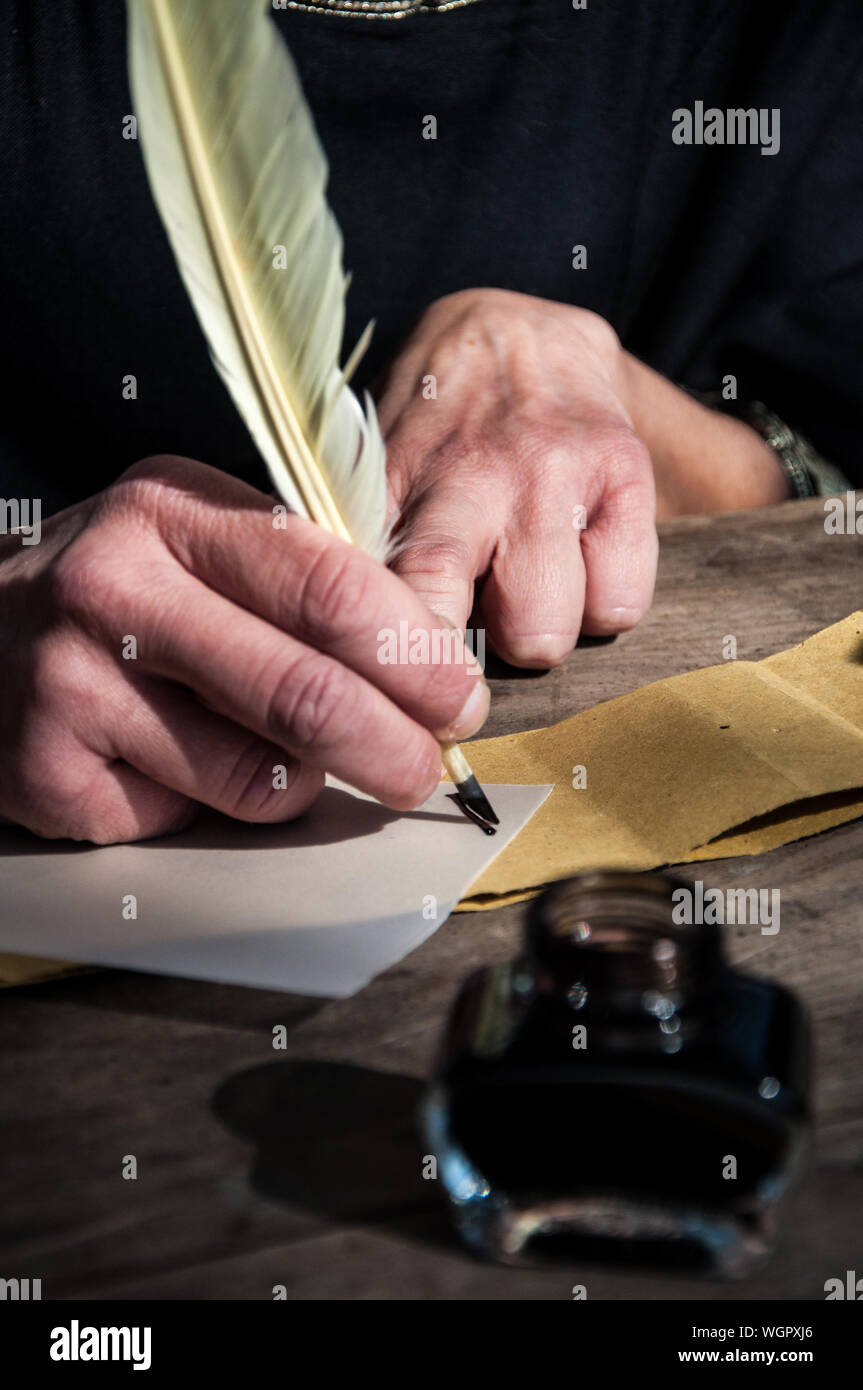 Hand writing feather hi-res stock photography and images - Alamy