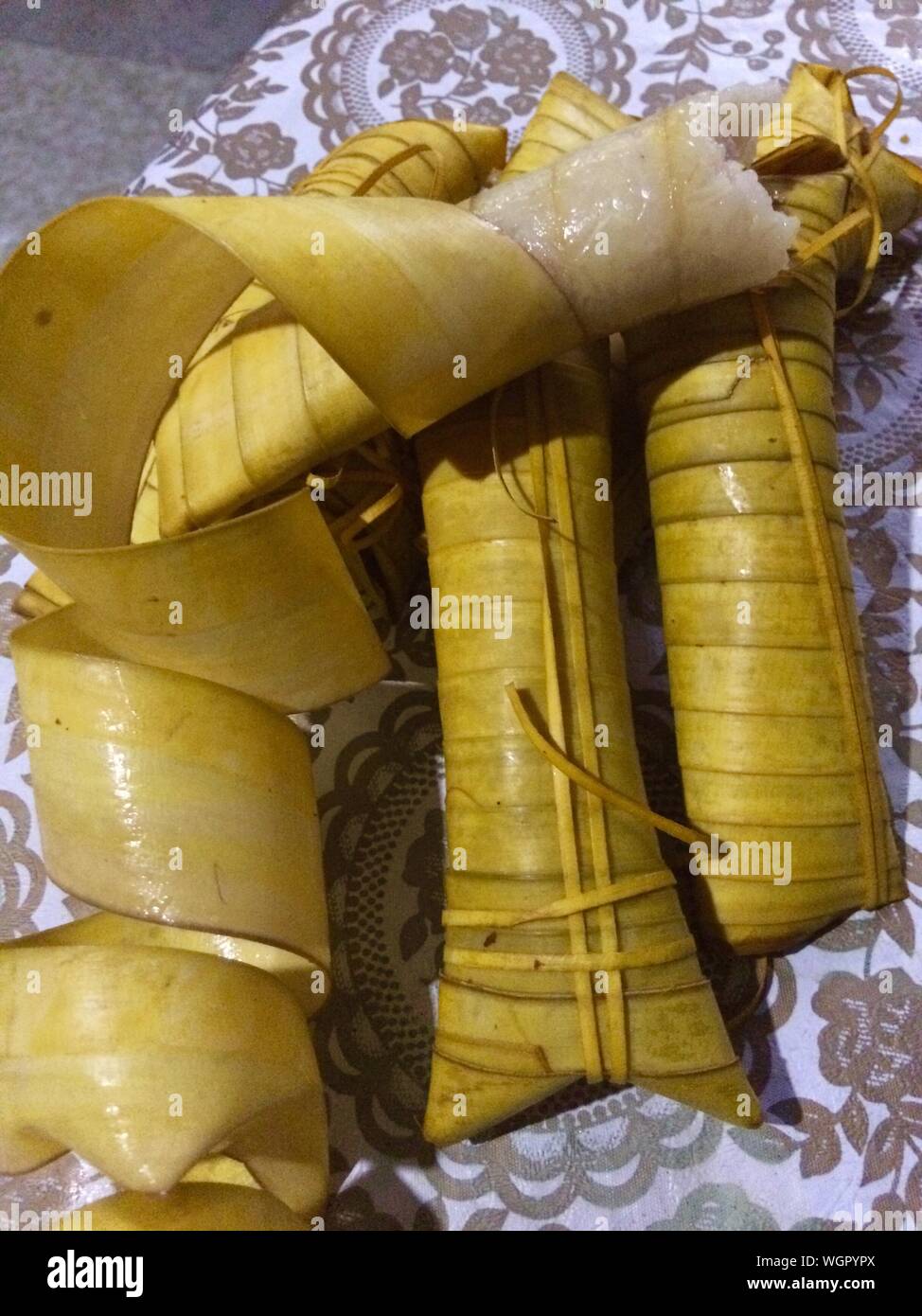 Cooked in banana leaf hi-res stock photography and images - Alamy