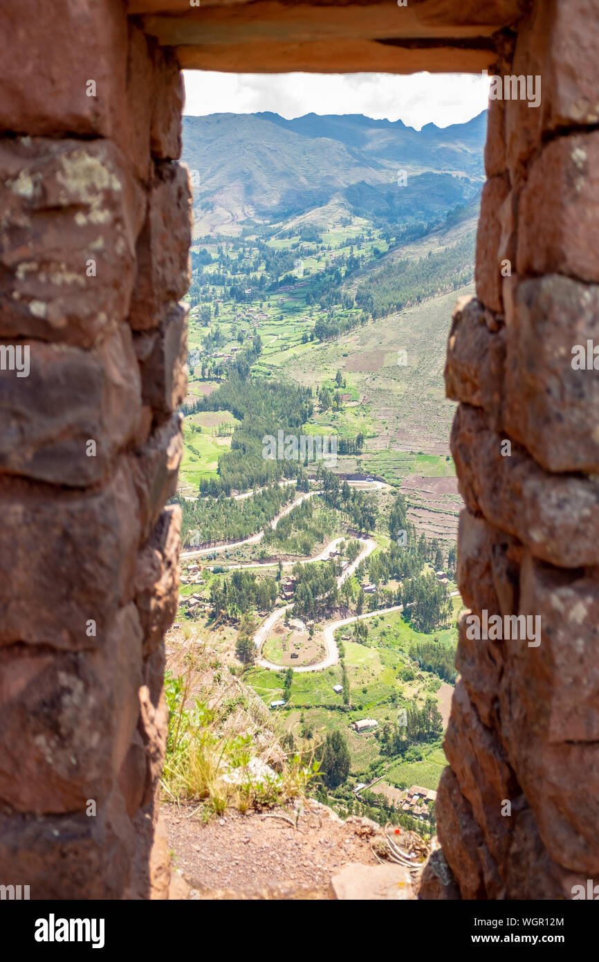 Pisac City Trough the Window of Ancient Incan Fort in The Ruins of ...