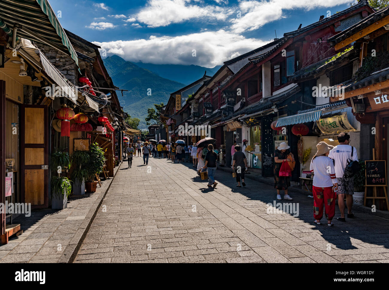 People on street in Dali Ancient City (Dali Old Town). Located in Dali ...