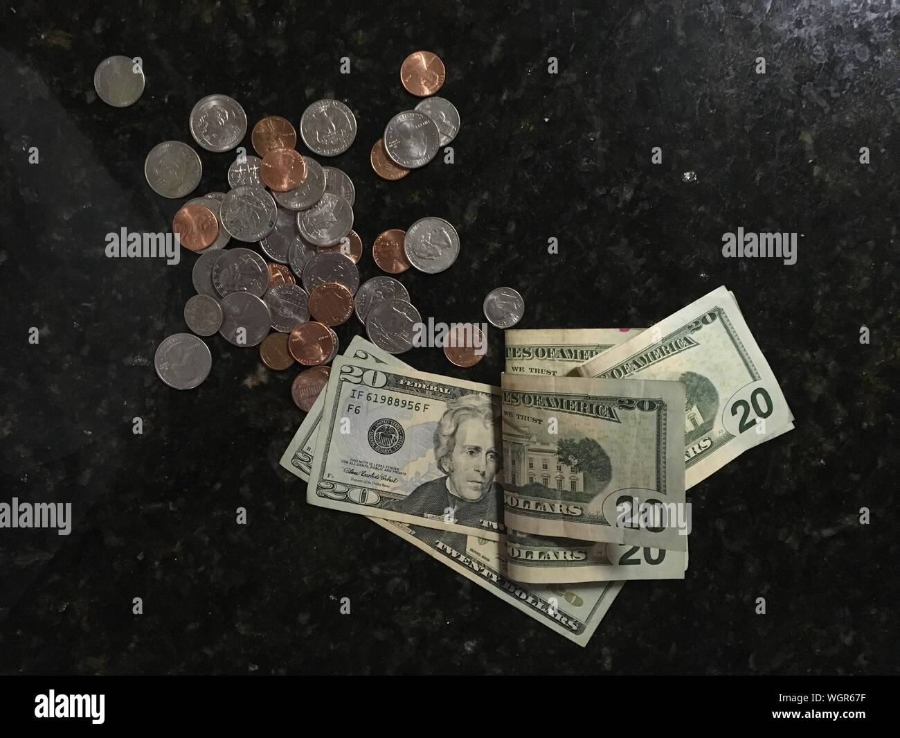 Us dollar notes and coins hi-res stock photography and images - Alamy