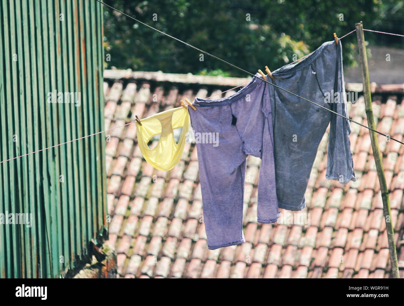 Hanging clothes on roof hi-res stock photography and images - Alamy