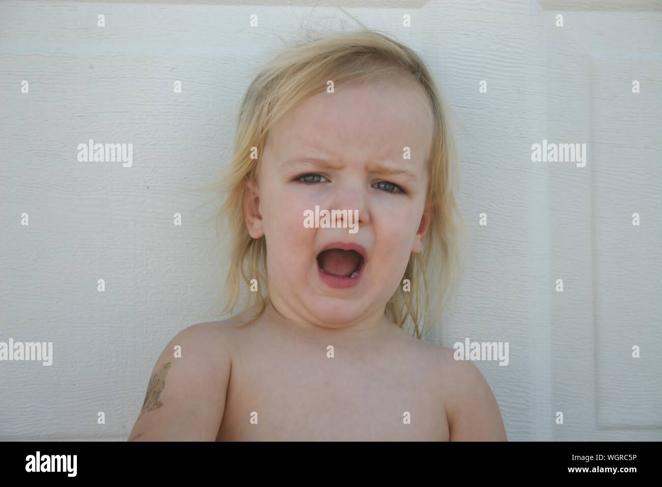 Girl Crying Against Wall High Resolution Stock Photography and Images ...