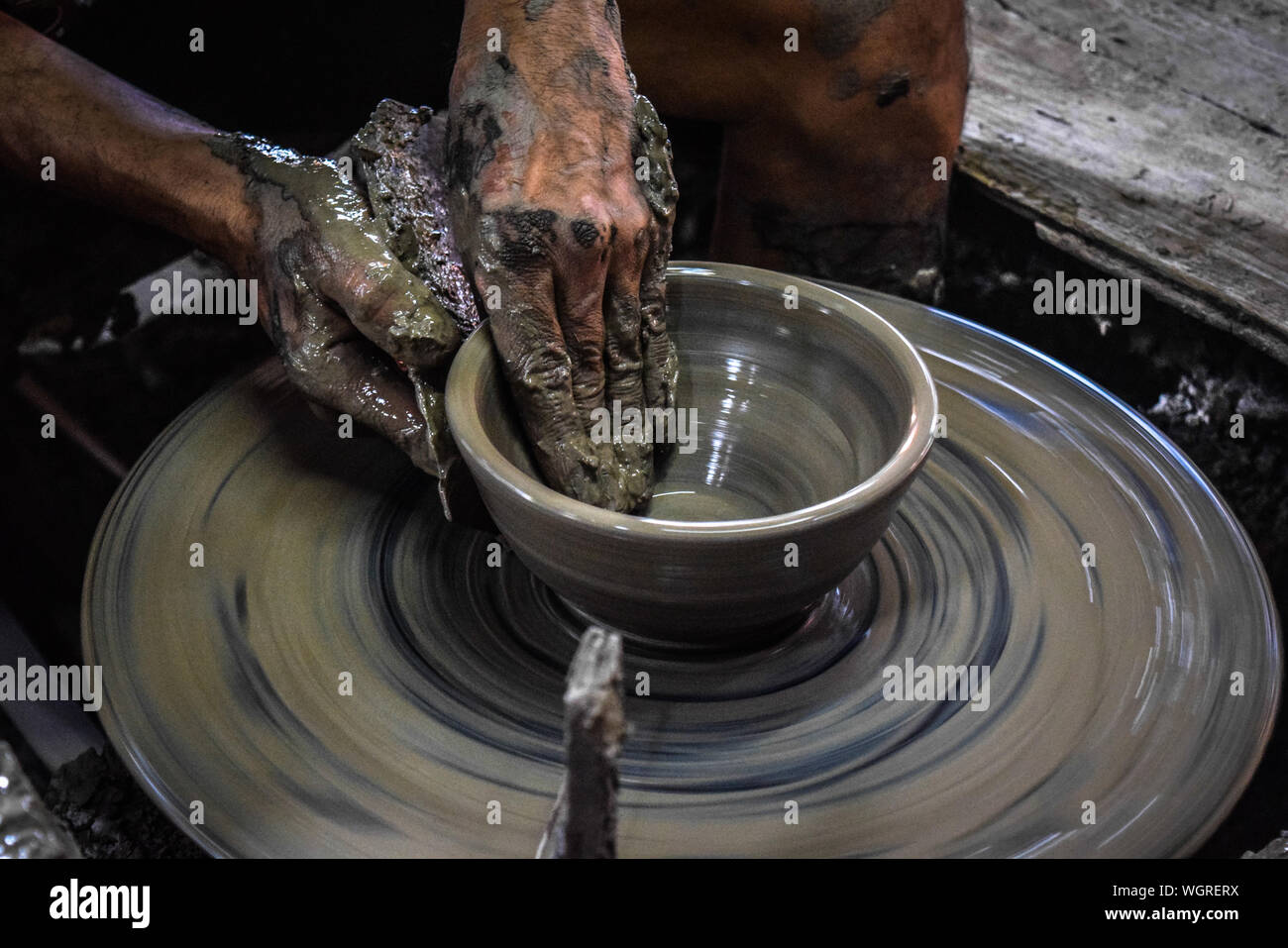 Working in mud hi-res stock photography and images - Alamy