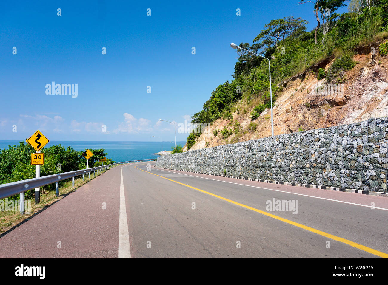 Blue sky background sea side road hi-res stock photography and images ...