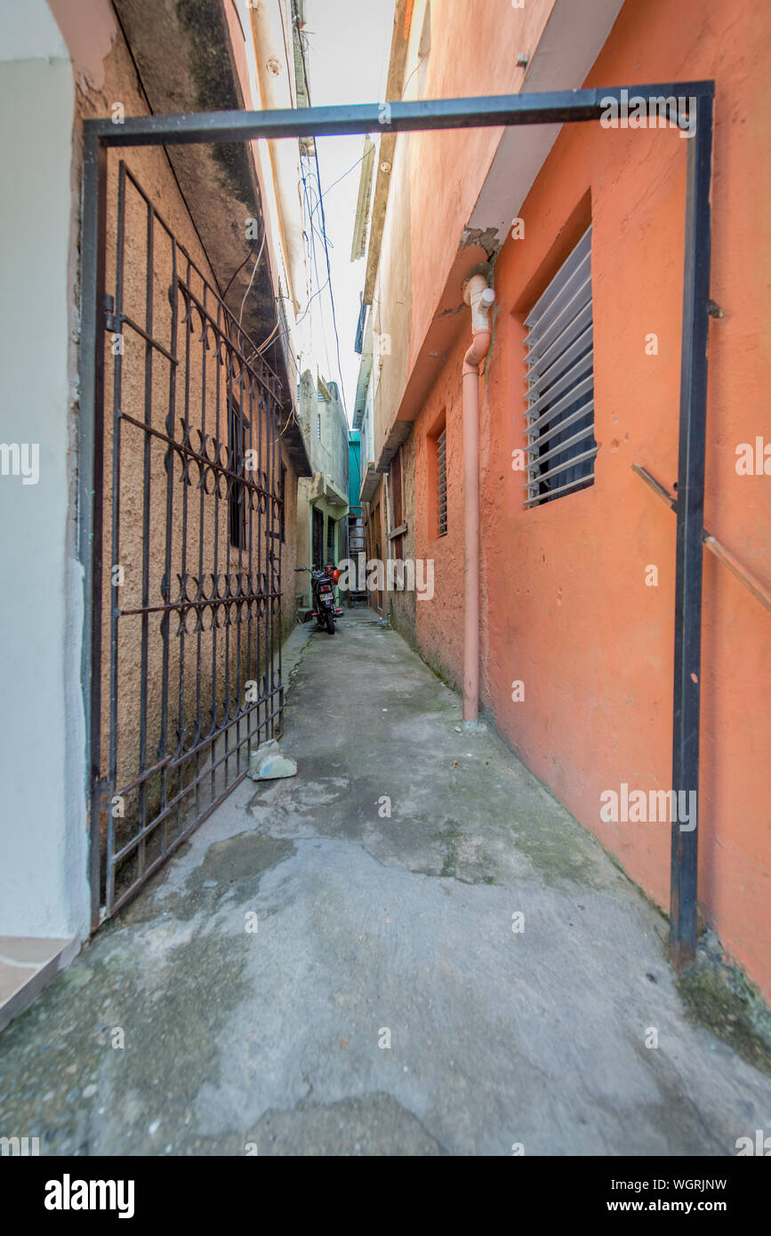 Corridor of Street Between Two Small Buildings Stock Photo - Alamy