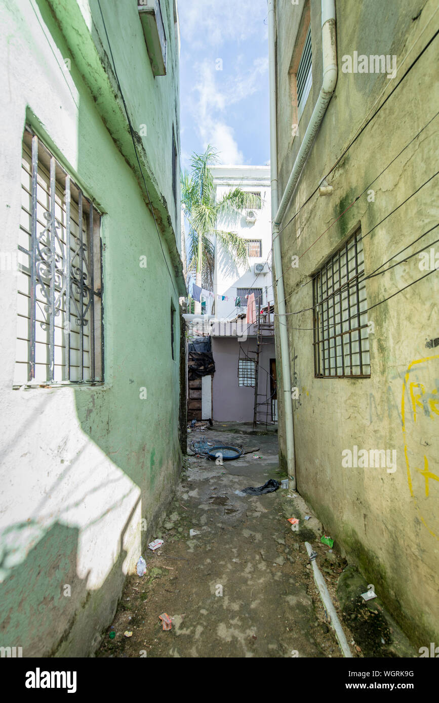Corridor of Street Between Two Small Buildings Stock Photo - Alamy