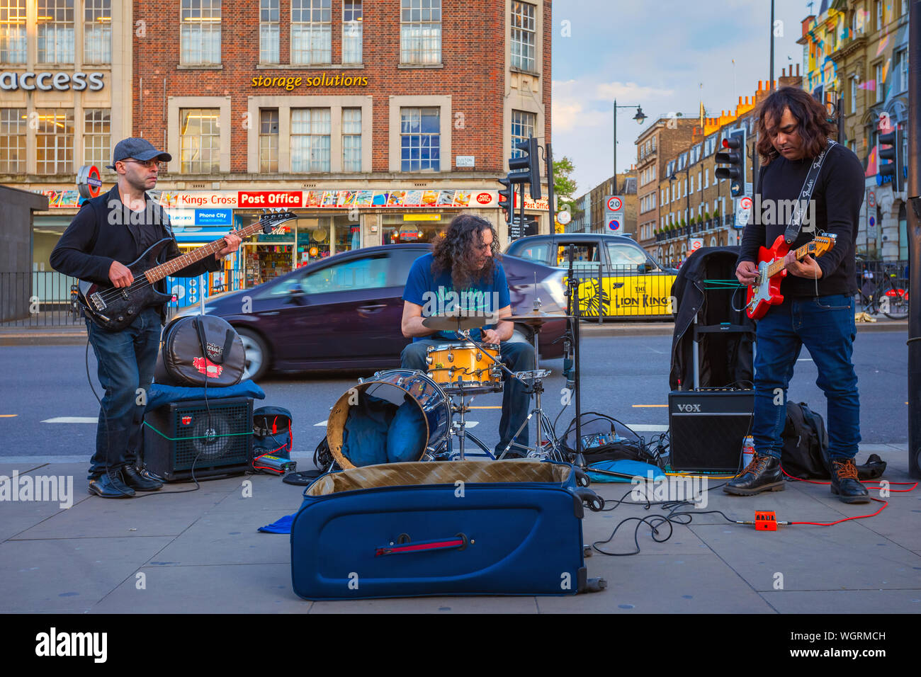 London, UK - May 15 2018: Unidentified group of street musicians ...
