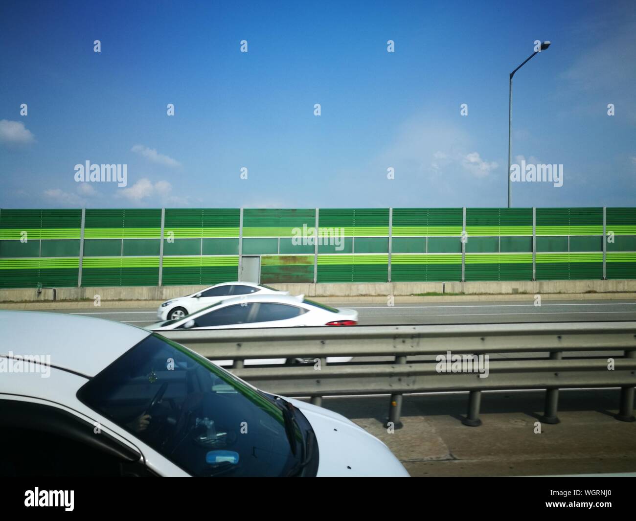 Cars road railing hi-res stock photography and images - Alamy