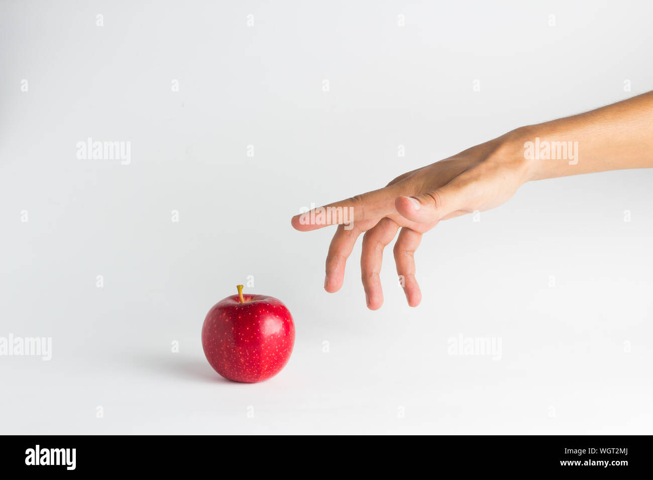 Hand Reaching For Apple High Resolution Stock Photography and Images ...