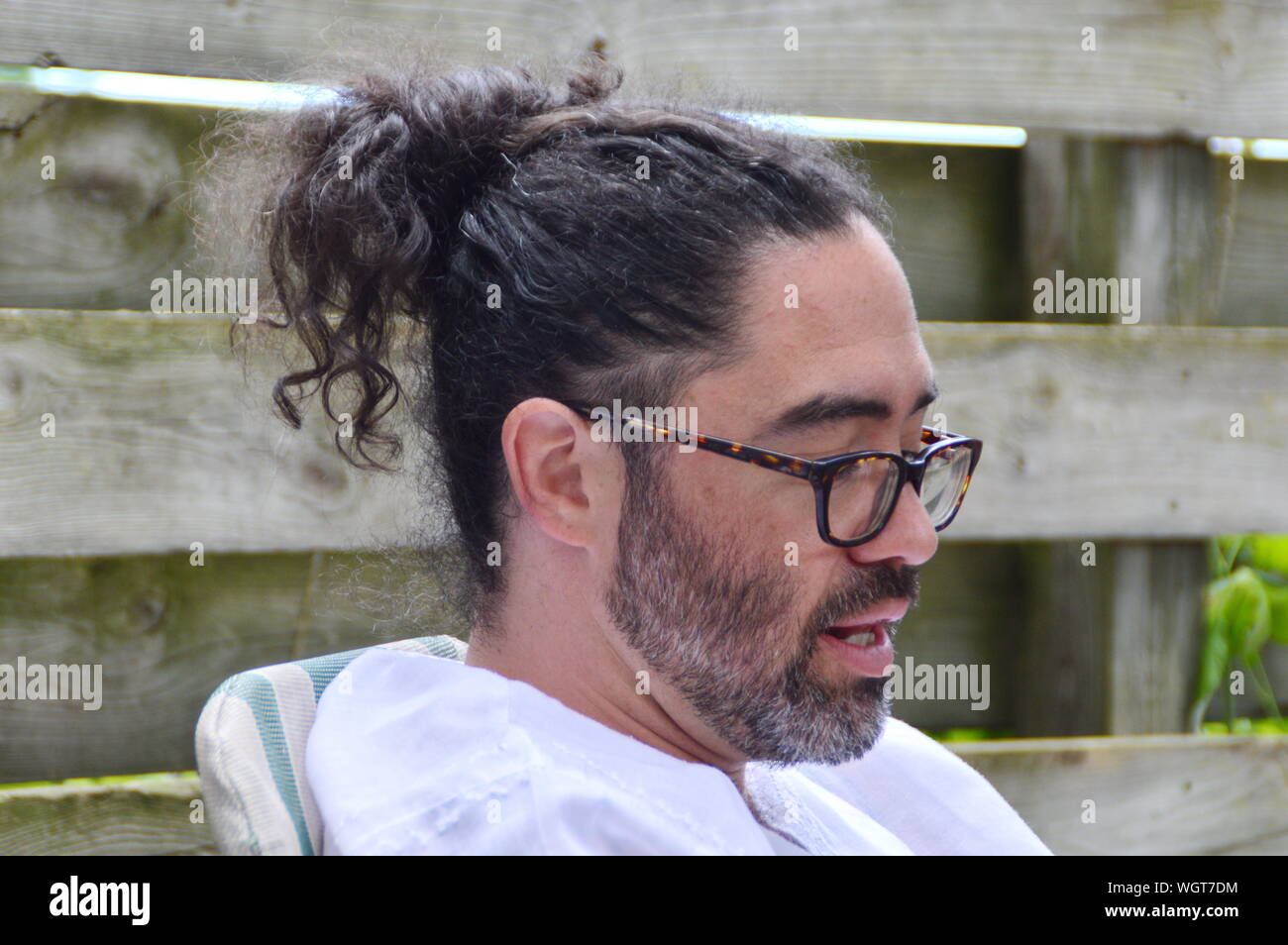 Man bun hair hi-res stock photography and images - Alamy