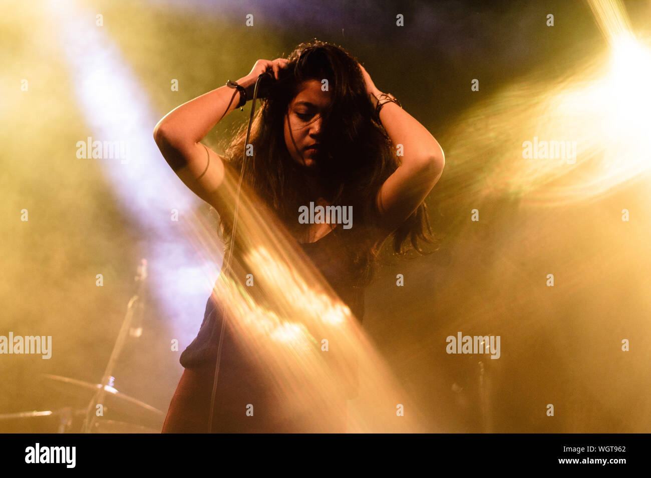 Woman microphone stage hi-res stock photography and images - Alamy