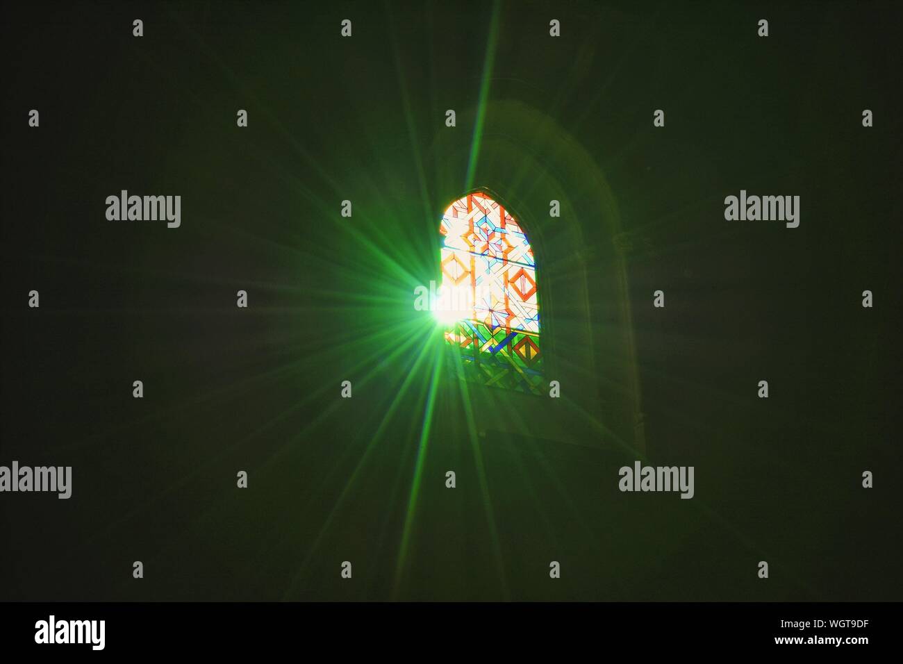 Sunlight Through Stained Glass Stock Photo - Alamy