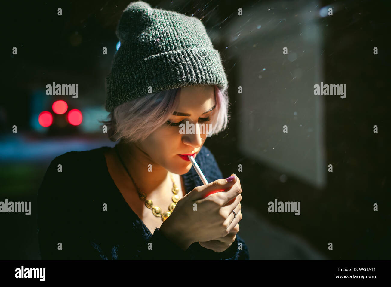 Close up woman lighting cigarette hi-res stock photography and images ...