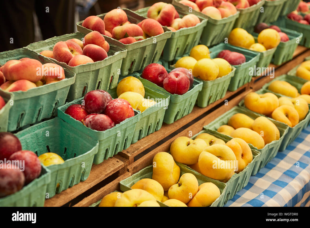 A display of summer tree fruit at the Headhouse Market in Philadelphia ...