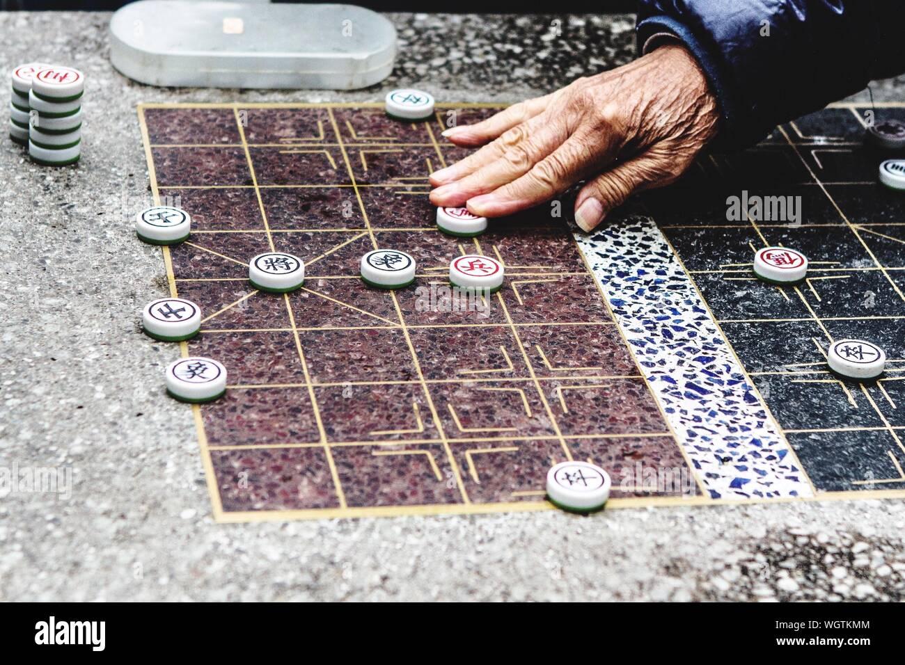 Men playing board game outdoors hi-res stock photography and images - Alamy