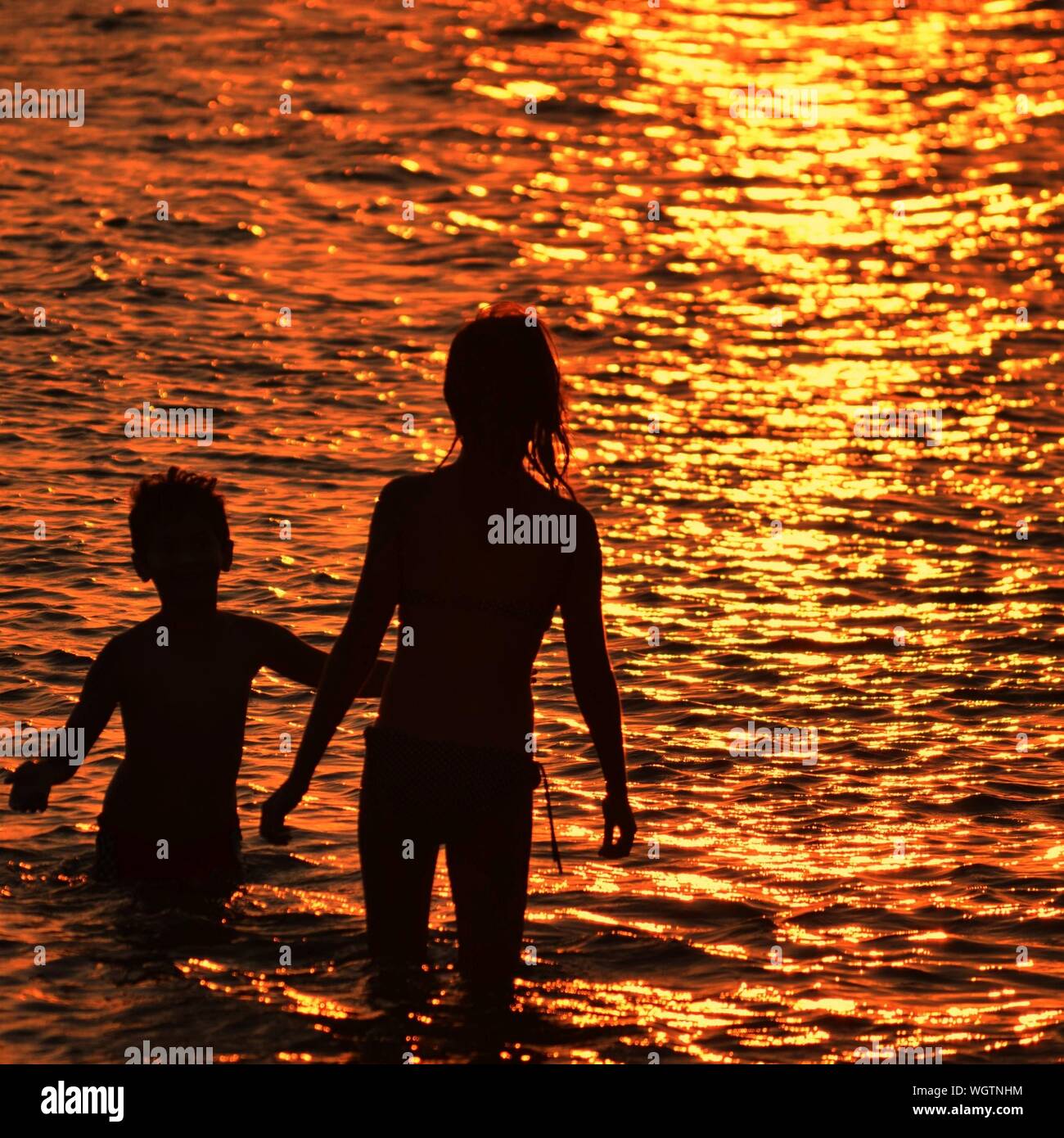 Siblings Silhouette High Resolution Stock Photography and Images - Alamy