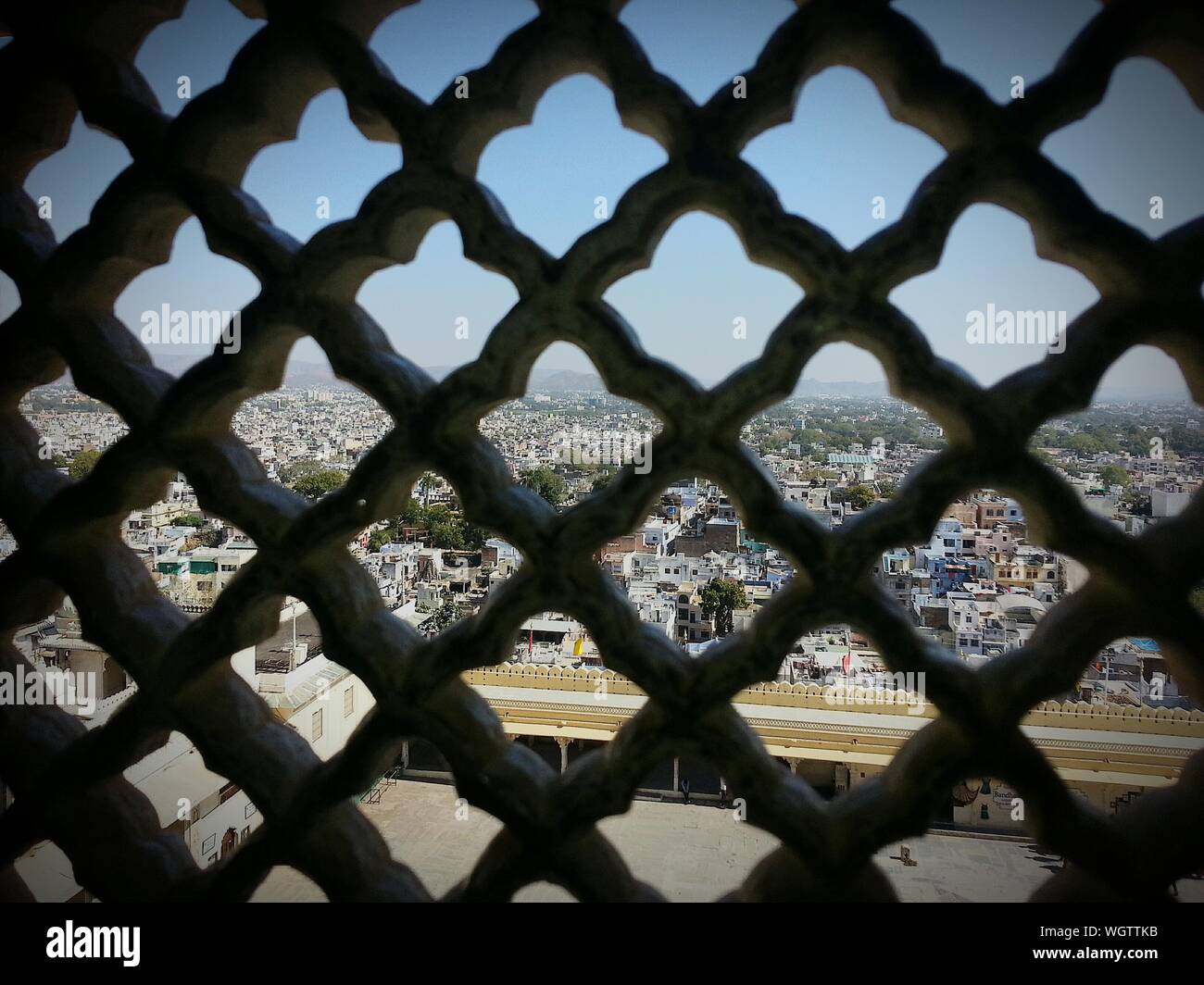 City seen through window frame hi-res stock photography and images - Alamy
