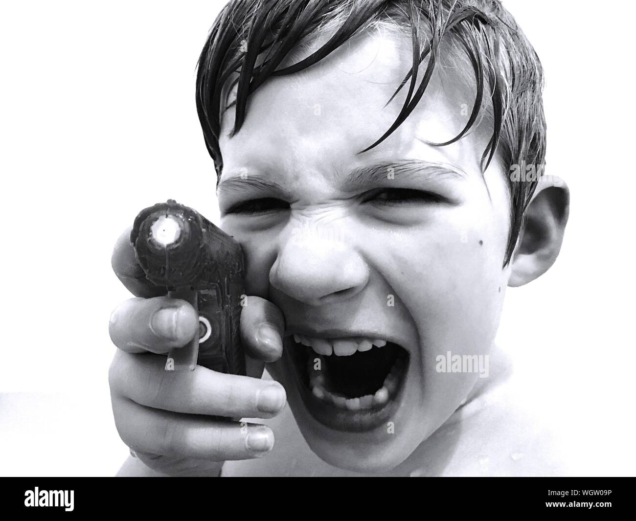 Hand holding toy gun hi-res stock photography and images - Alamy