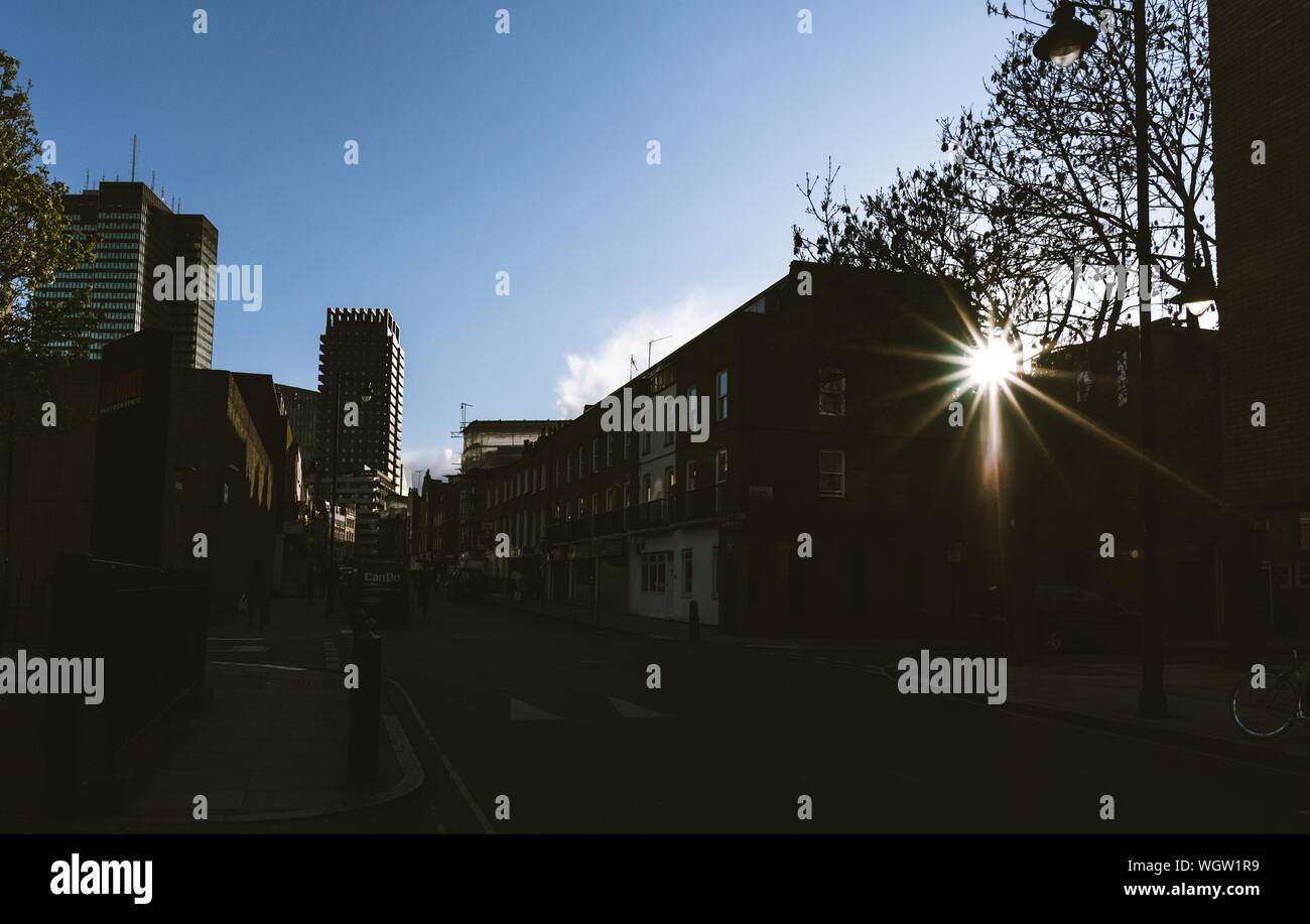 City Street At Sunset Stock Photo - Alamy
