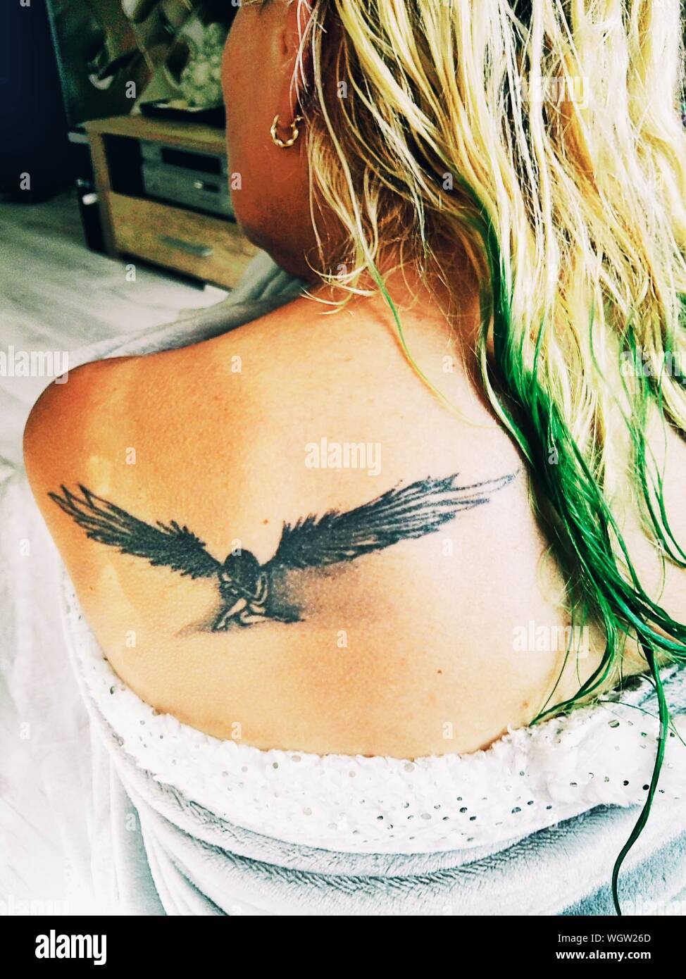 Woman with tattoo on shoulder hi-res stock photography and images - Alamy