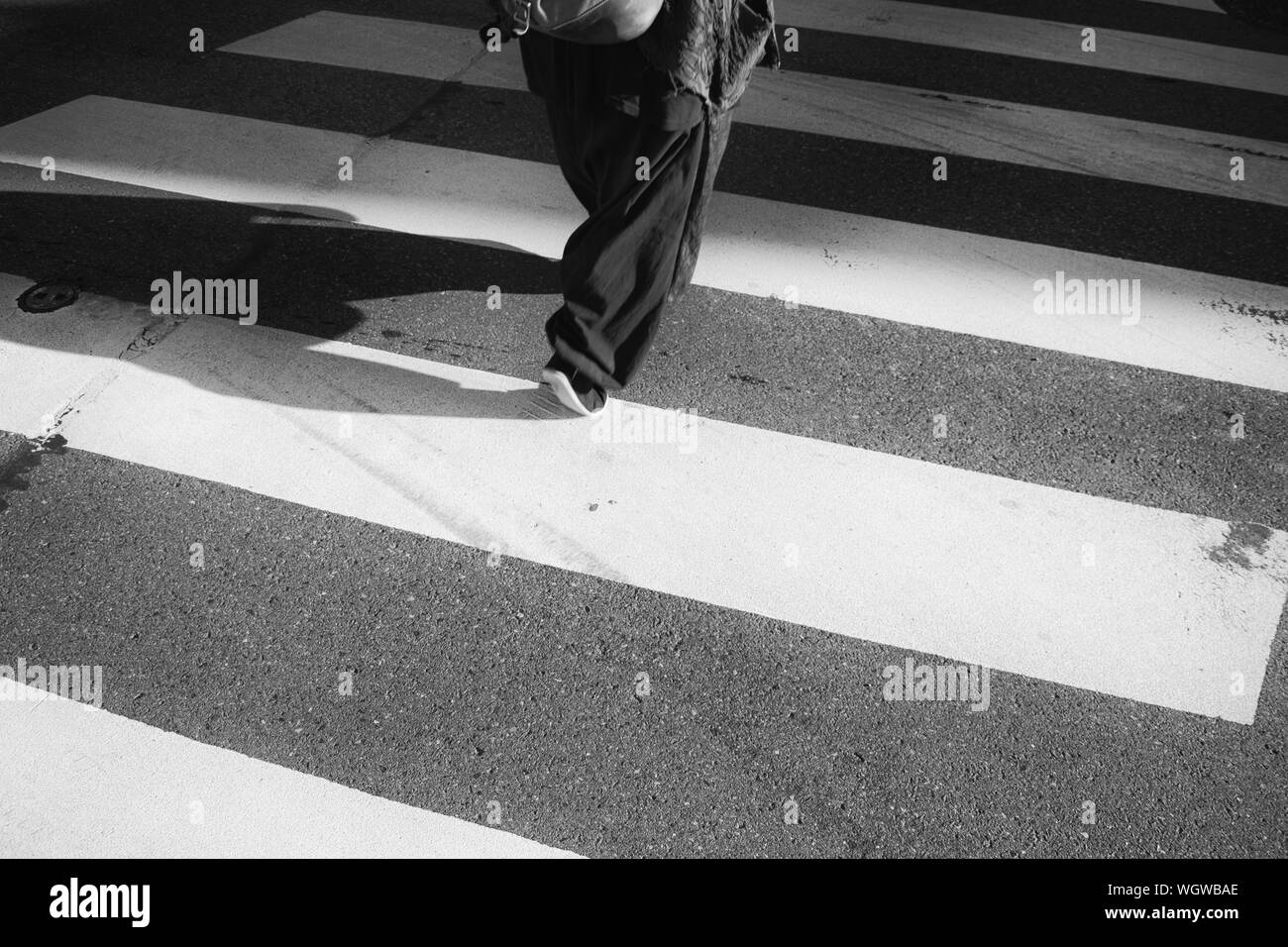 Person crossing a road hi-res stock photography and images - Alamy