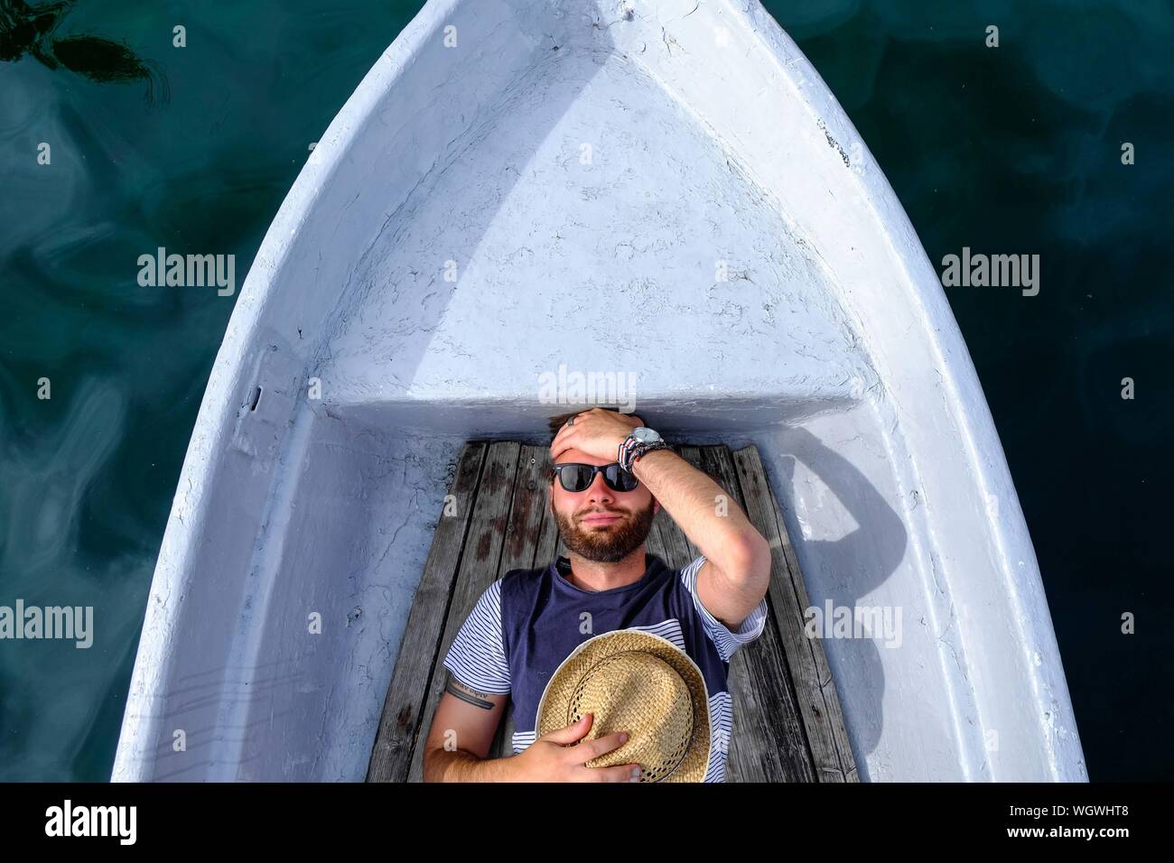 Sleeping in boat hi-res stock photography and images - Alamy