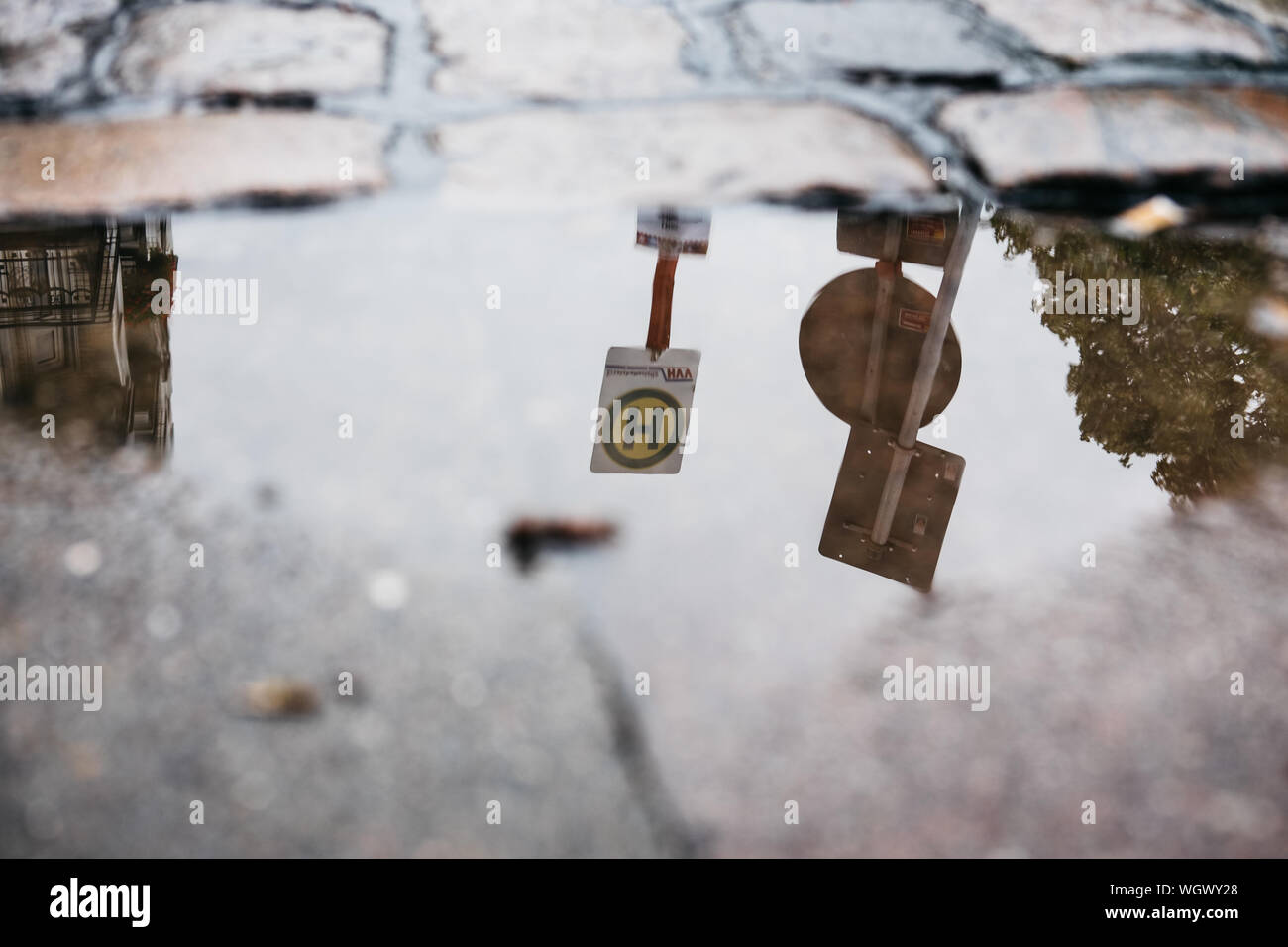 Sign reflection puddle water hi-res stock photography and images - Alamy