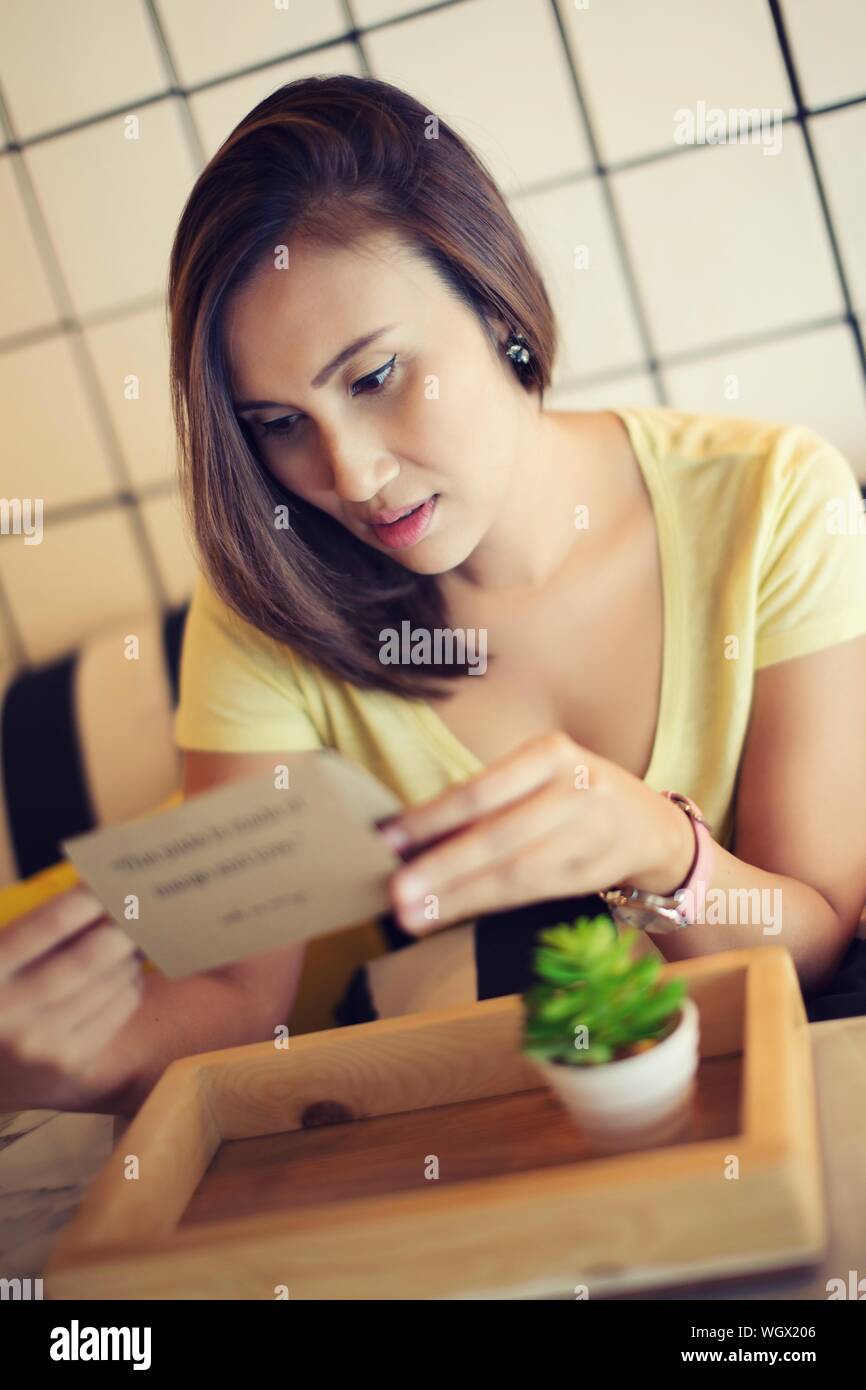 Woman Reading Greeting Card High Resolution Stock Photography and ...