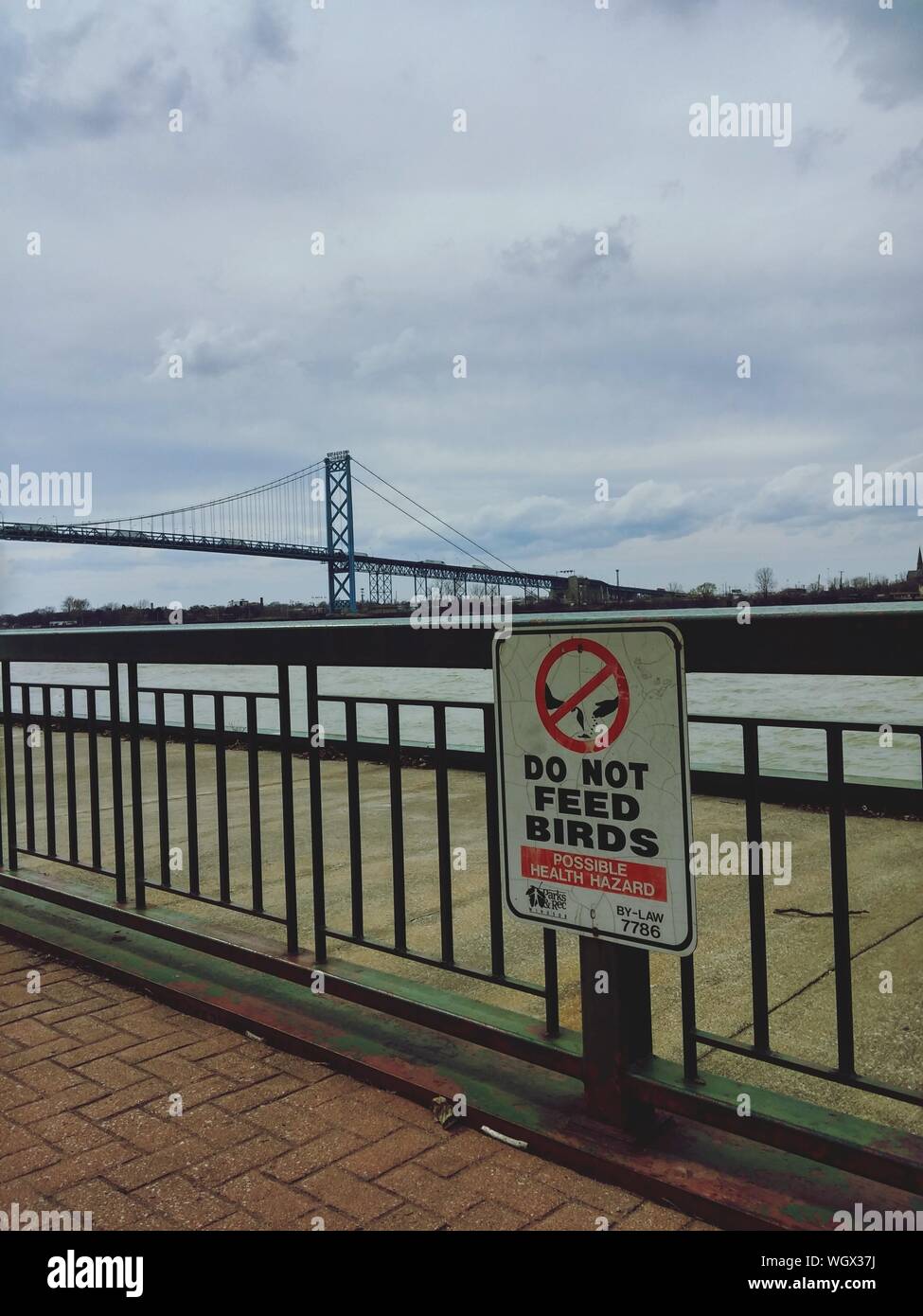 Warning on railing hi-res stock photography and images - Alamy