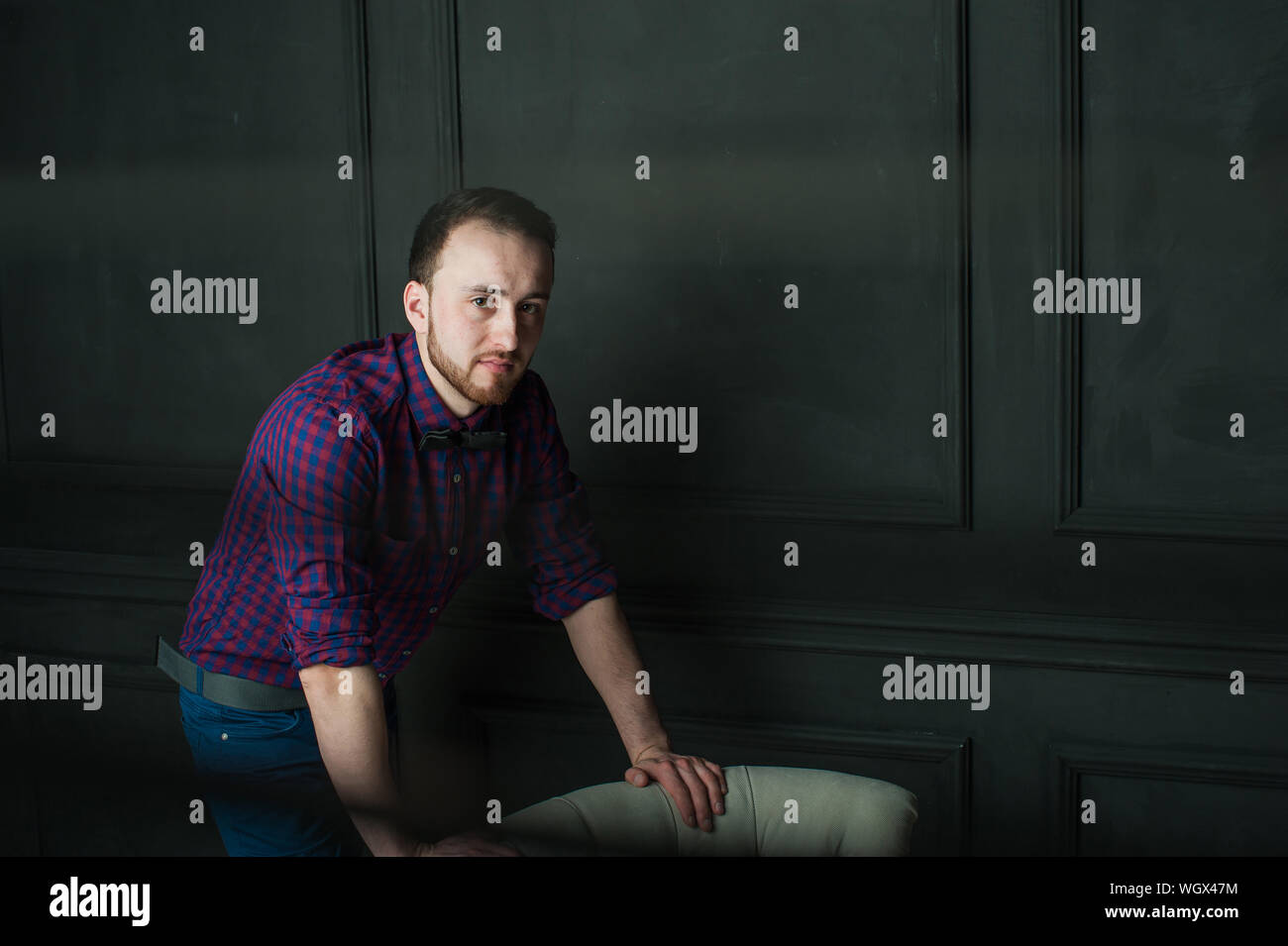 Man leaning chair hi-res stock photography and images - Alamy