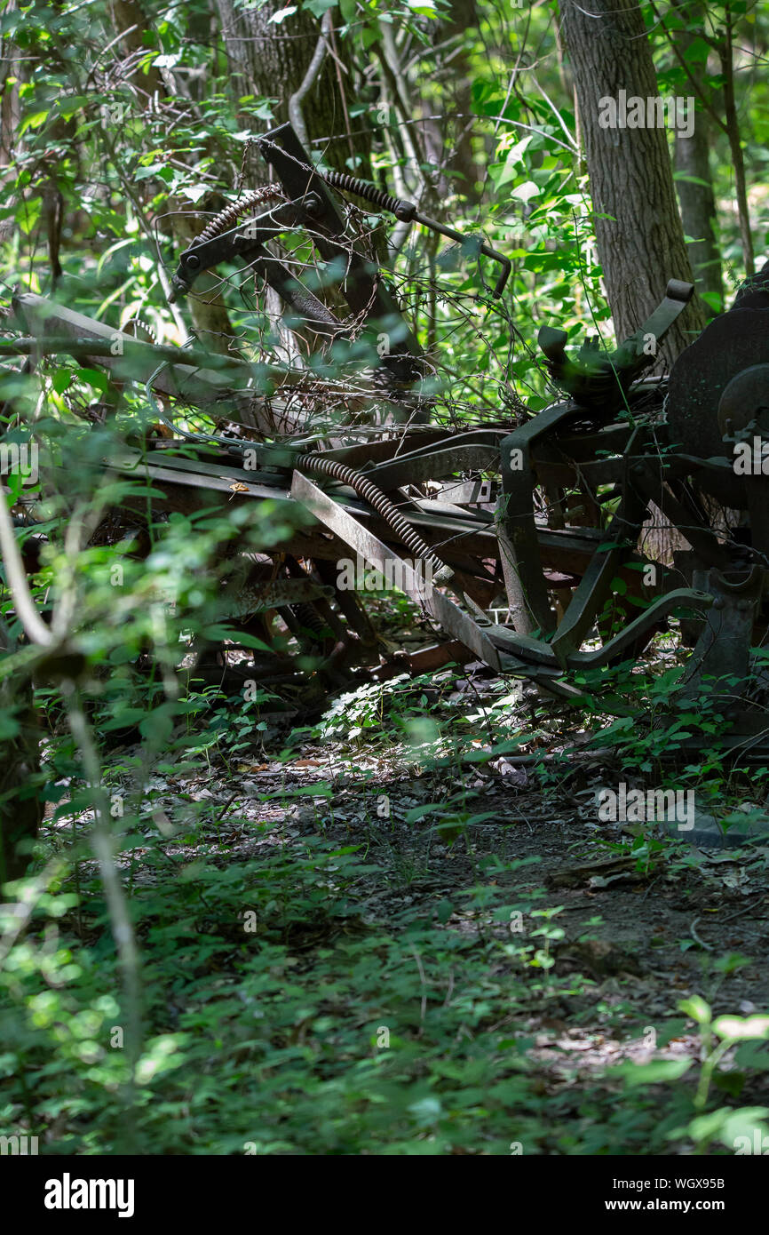 Large, rusty old equipment littering a natural habitat Stock Photo - Alamy