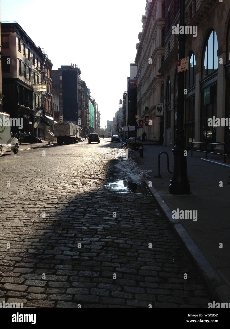 Cobblestone street along buildings architecture hi-res stock ...