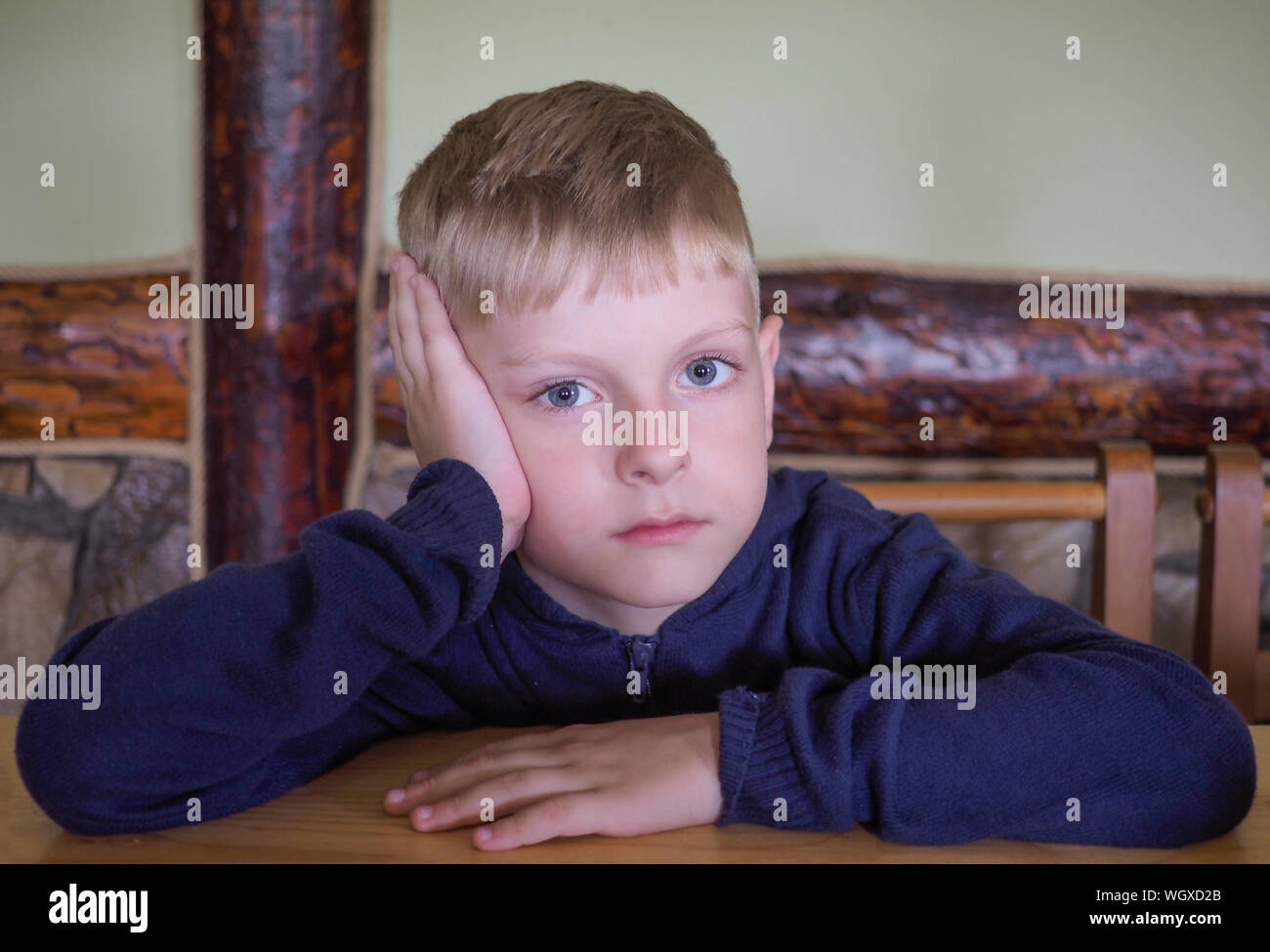Sad looking boy hi-res stock photography and images - Alamy