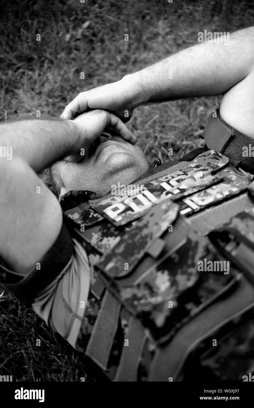 Sad police officer hi-res stock photography and images - Alamy