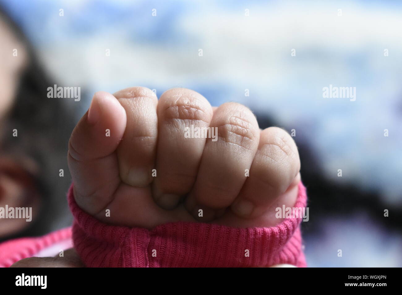 Baby fist hi-res stock photography and images - Alamy