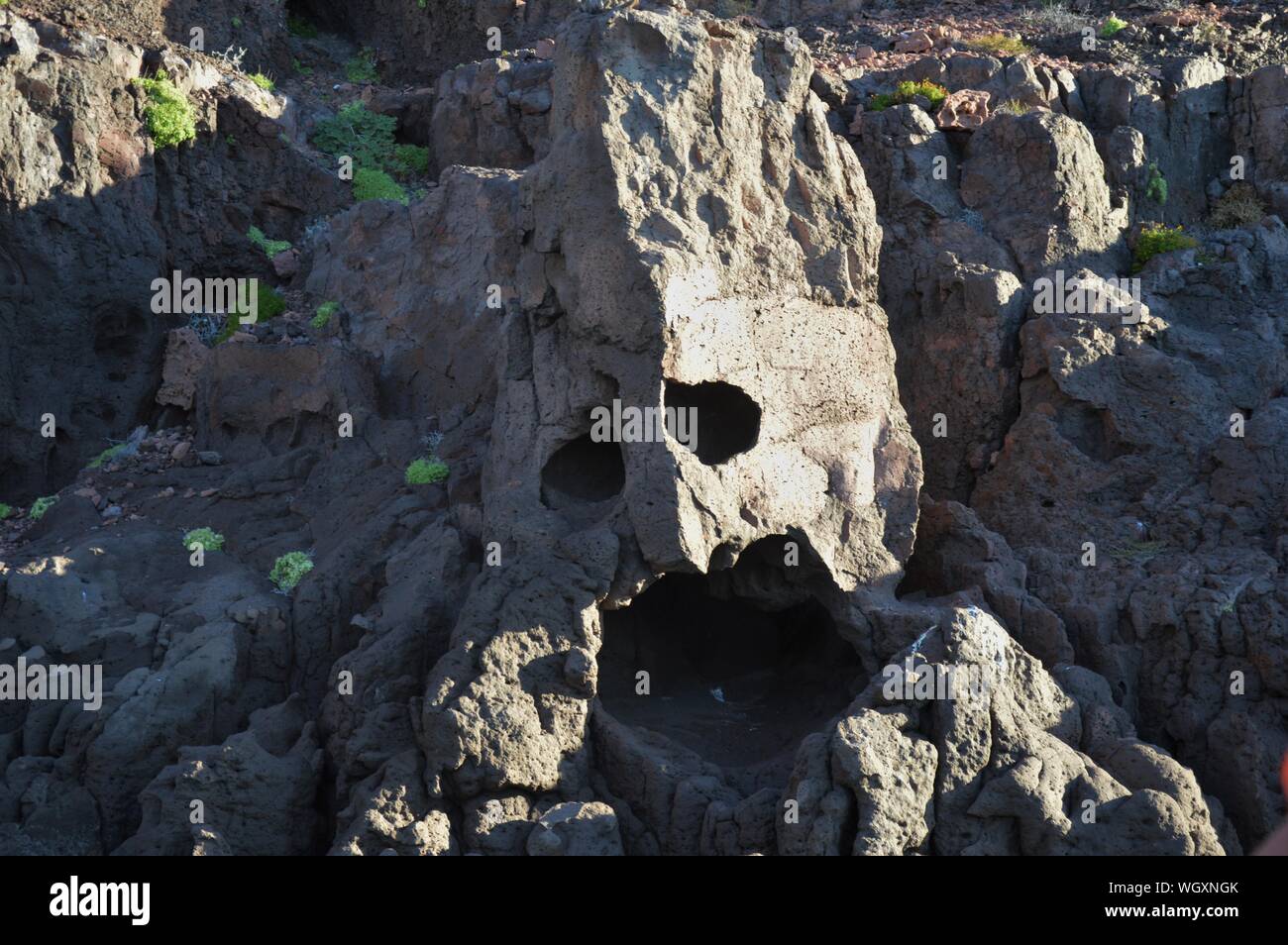 Human face in rock hi-res stock photography and images - Alamy