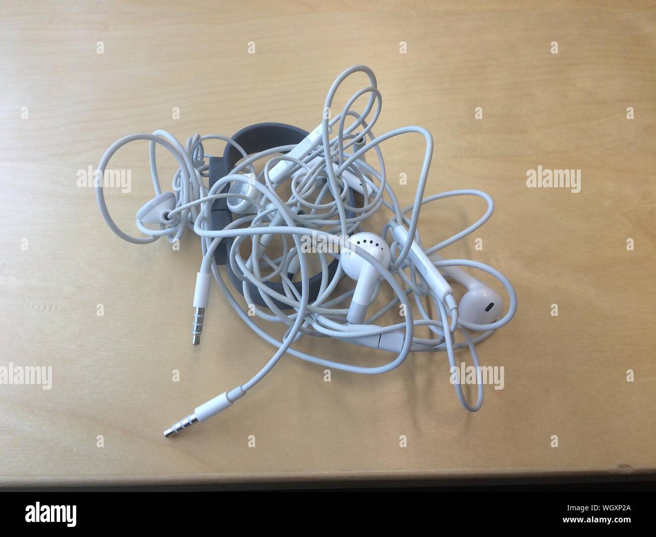 Tangled headphones hi-res stock photography and images - Alamy