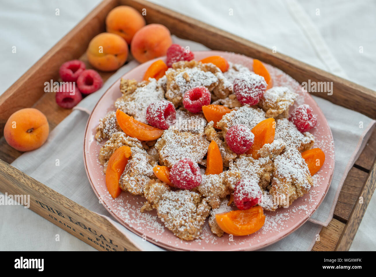 Kaiserschmarrn - traditional austrian pancake dessert with fresh fruit ...