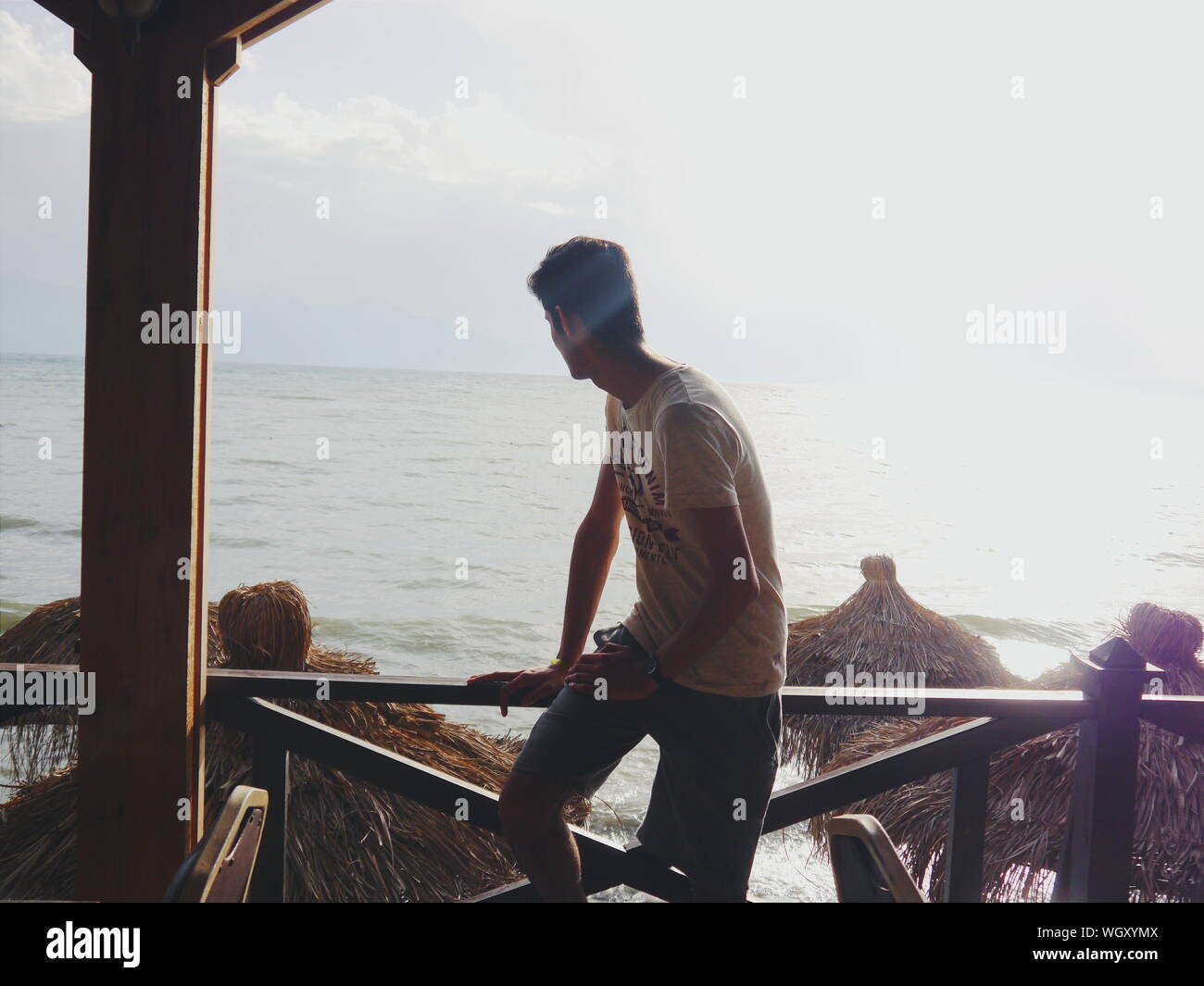 People looking over balcony hi-res stock photography and images - Alamy